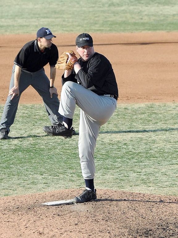 Fr. Andrew Fisher pitches in for Christ - Arlington Catholic Herald