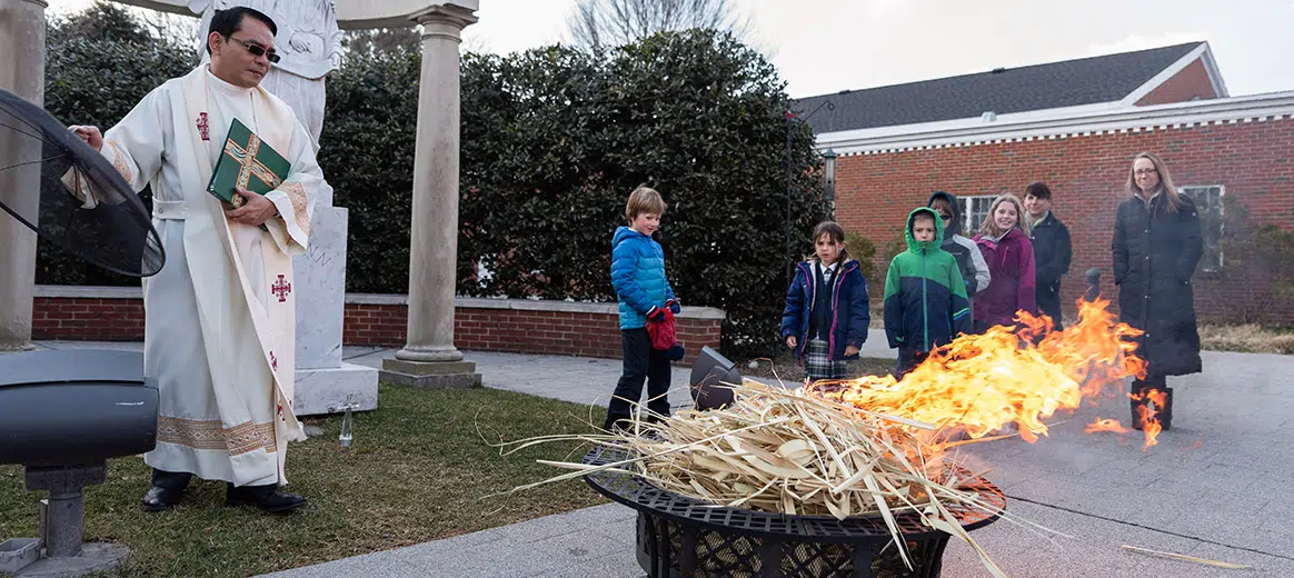 Burning palms for Ash Wednesday - Arlington Catholic Herald
