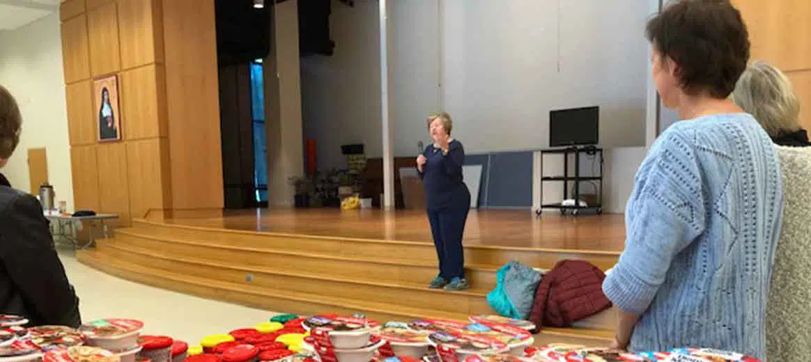 Vienna volunteers donate 'power packs' to children - Arlington Catholic ...