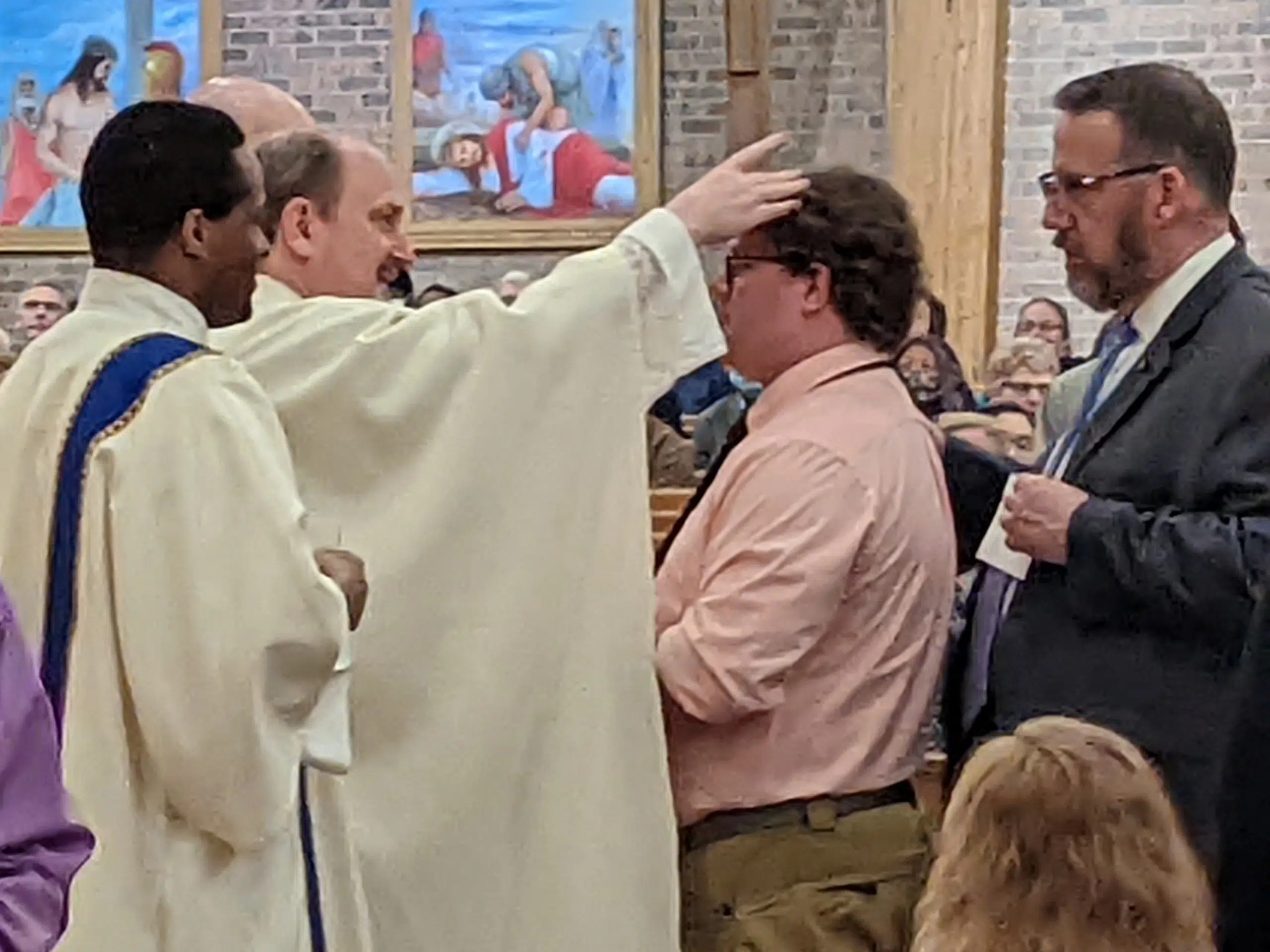 Violin instructor joins the church on the Easter Vigil - Arlington ...