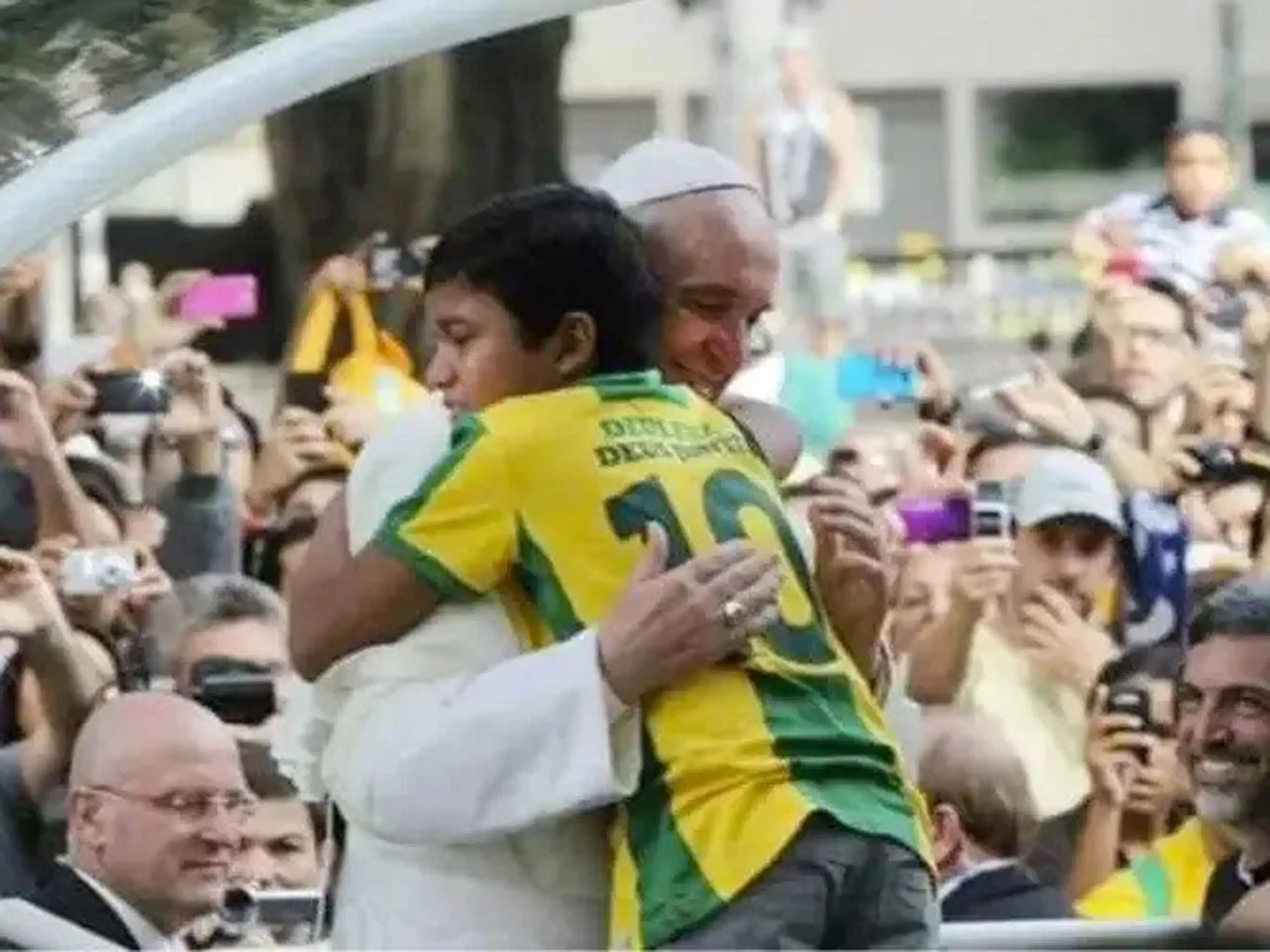 Boy who got past security barrier to embrace Pope Francis at World ...
