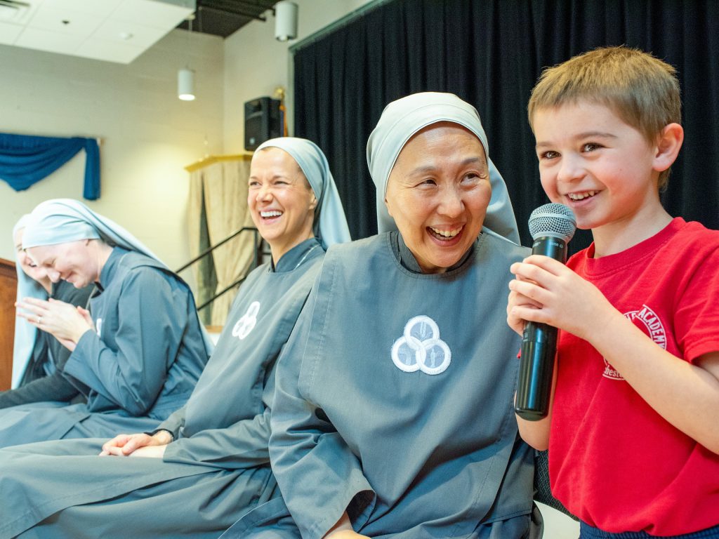 The ‘Groovy Nun’ makes a big impression at Sacred Heart Academy in ...